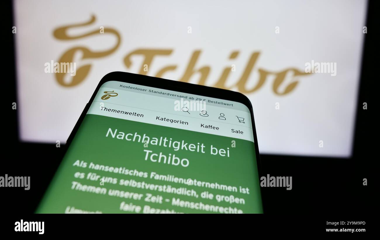 In this photo illustration, a mobile phone with the website of German ...