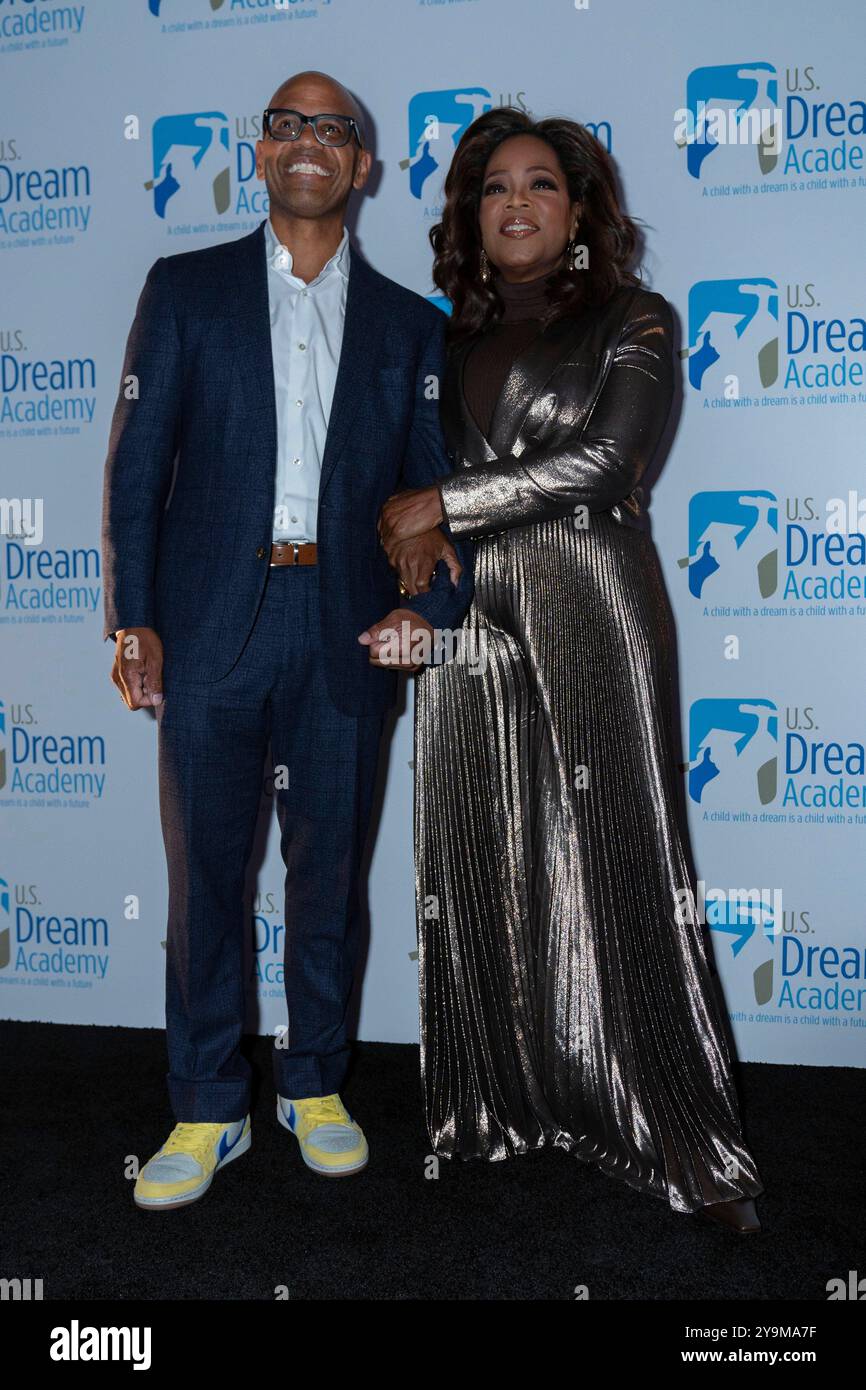 Oprah Winfrey, right, and Demond Martin pose for photographers at the ...