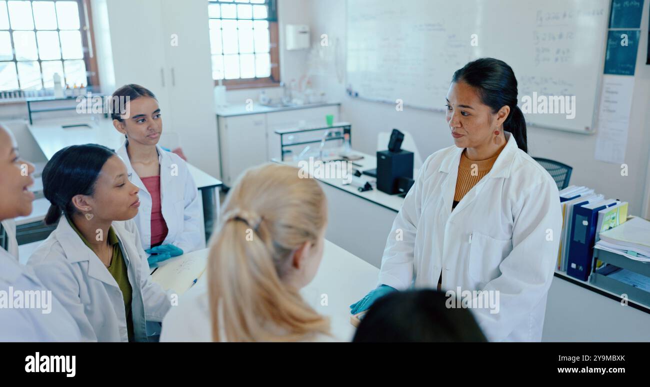 Science, laboratory and teacher with students for education, learning ...