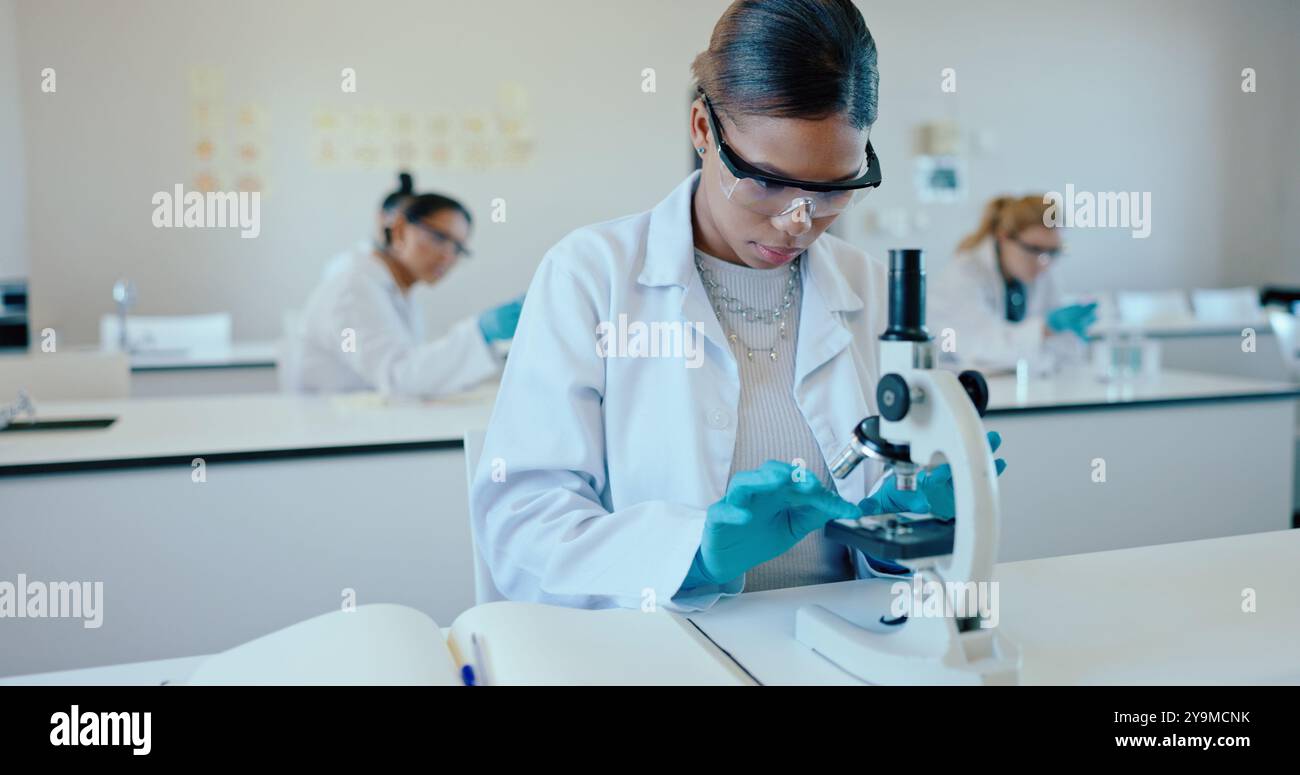 Sample, girl and microscope in science classroom for chemistry analysis, study experiment and ...