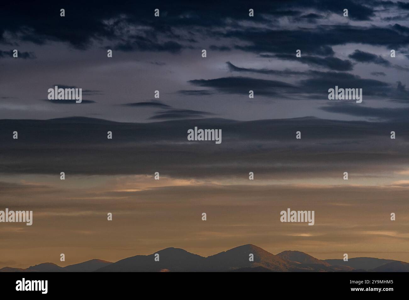 Dramatic Cloudy Sky Over Double Hill Mountain: A Beautiful Landscape ...