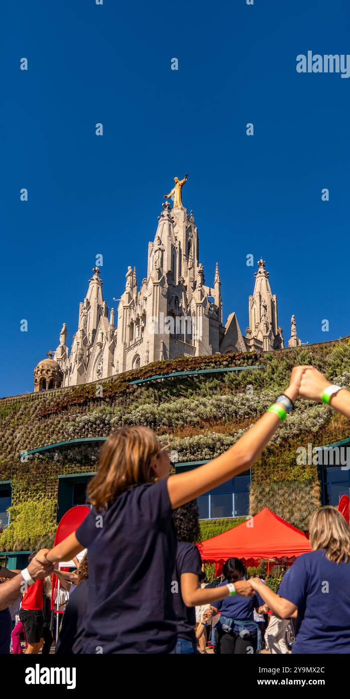 Young people from a cultural group dance hand in hand the traditional ...