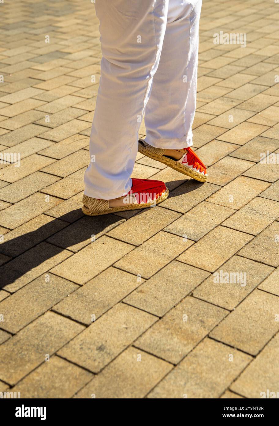 Close-up of feet wearing the typical Catalan folk footwear, espardenyes ...