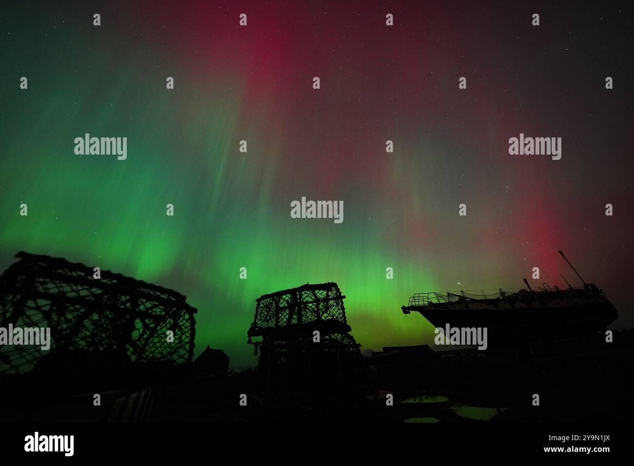 The Northern Lights, also known as the Aurora Borealis, seen in an ...