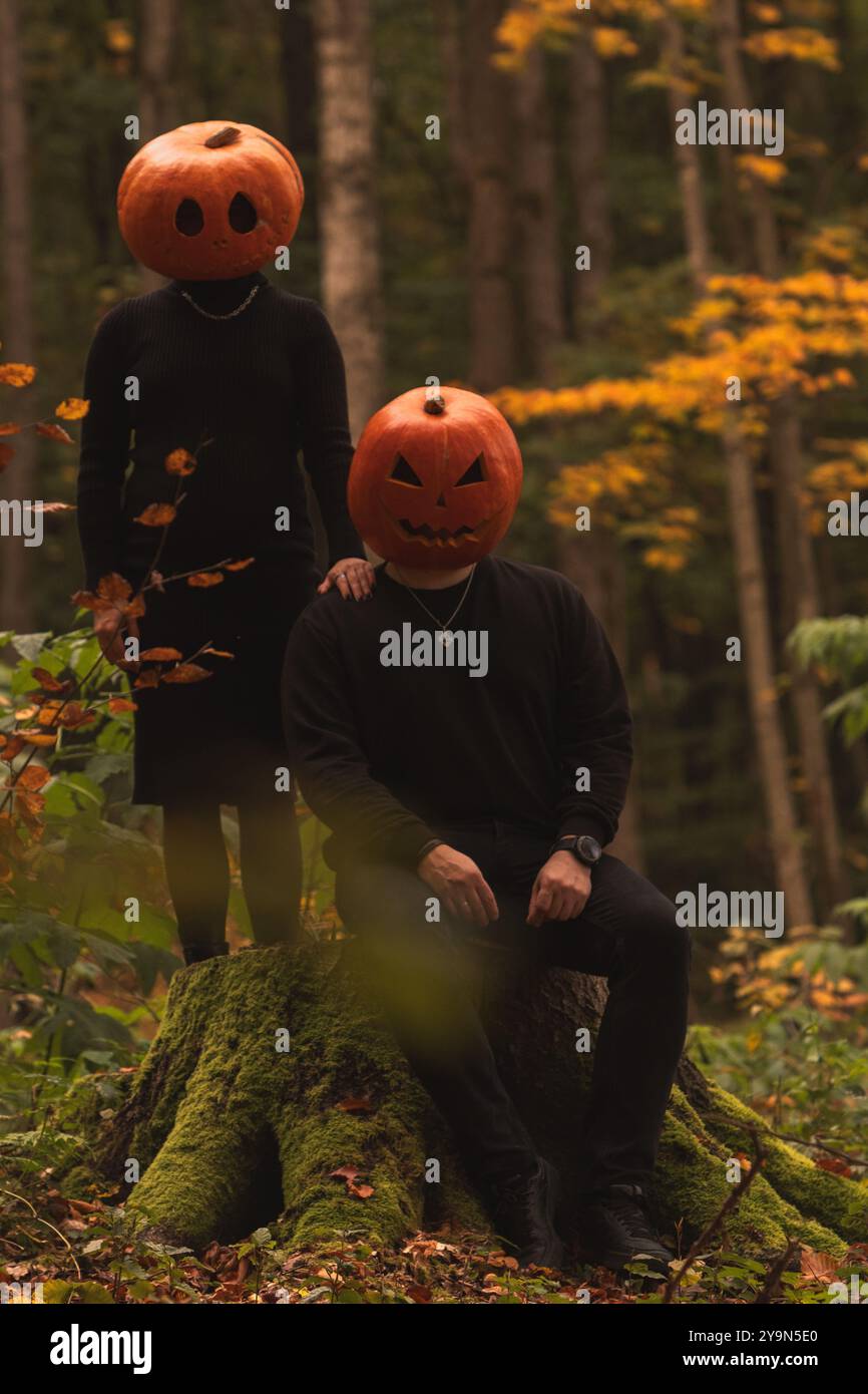 Halloween Pumpkin Heads in Autumn Forest Stock Photo - Alamy