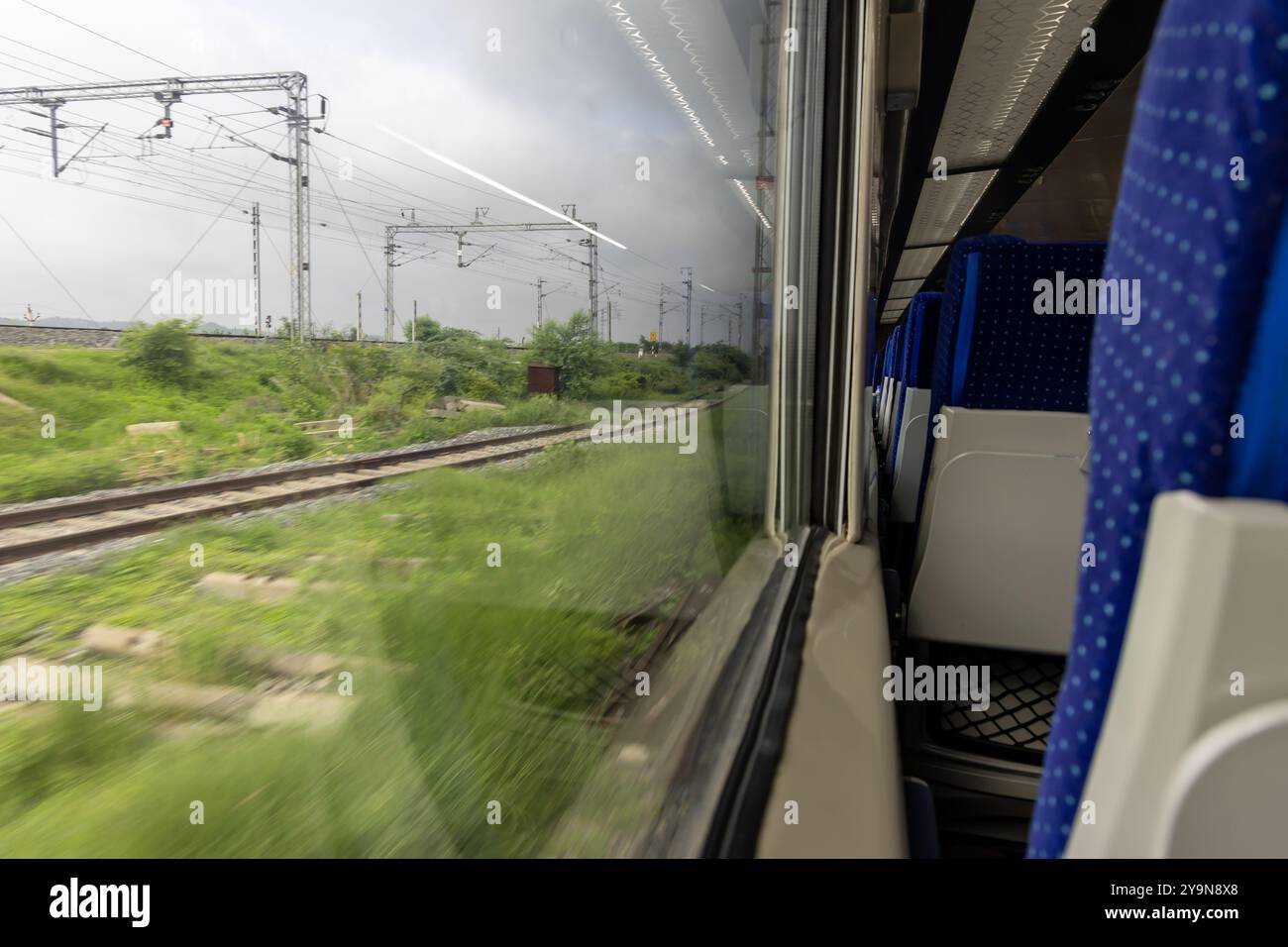 High Speed Passenger Train Window View in Motion During Daytime with ...