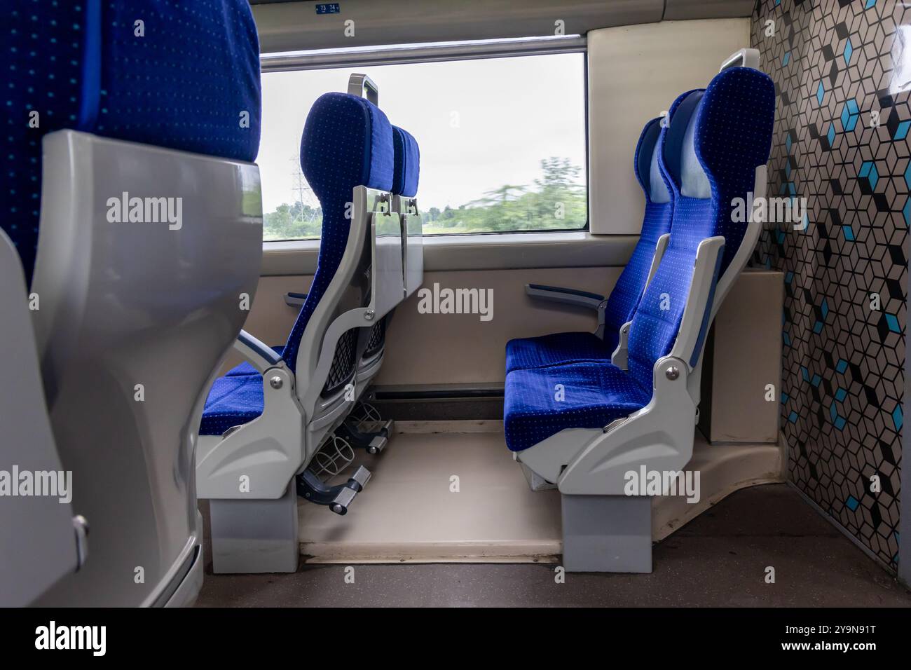 Vacant Passenger Train Seat with Window View in Motion During Daytime ...