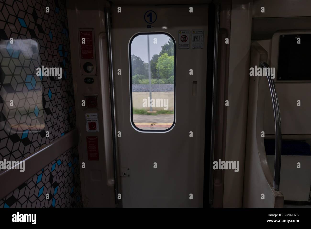 Passenger Train Door Window View During Daytime image is taken of vande ...