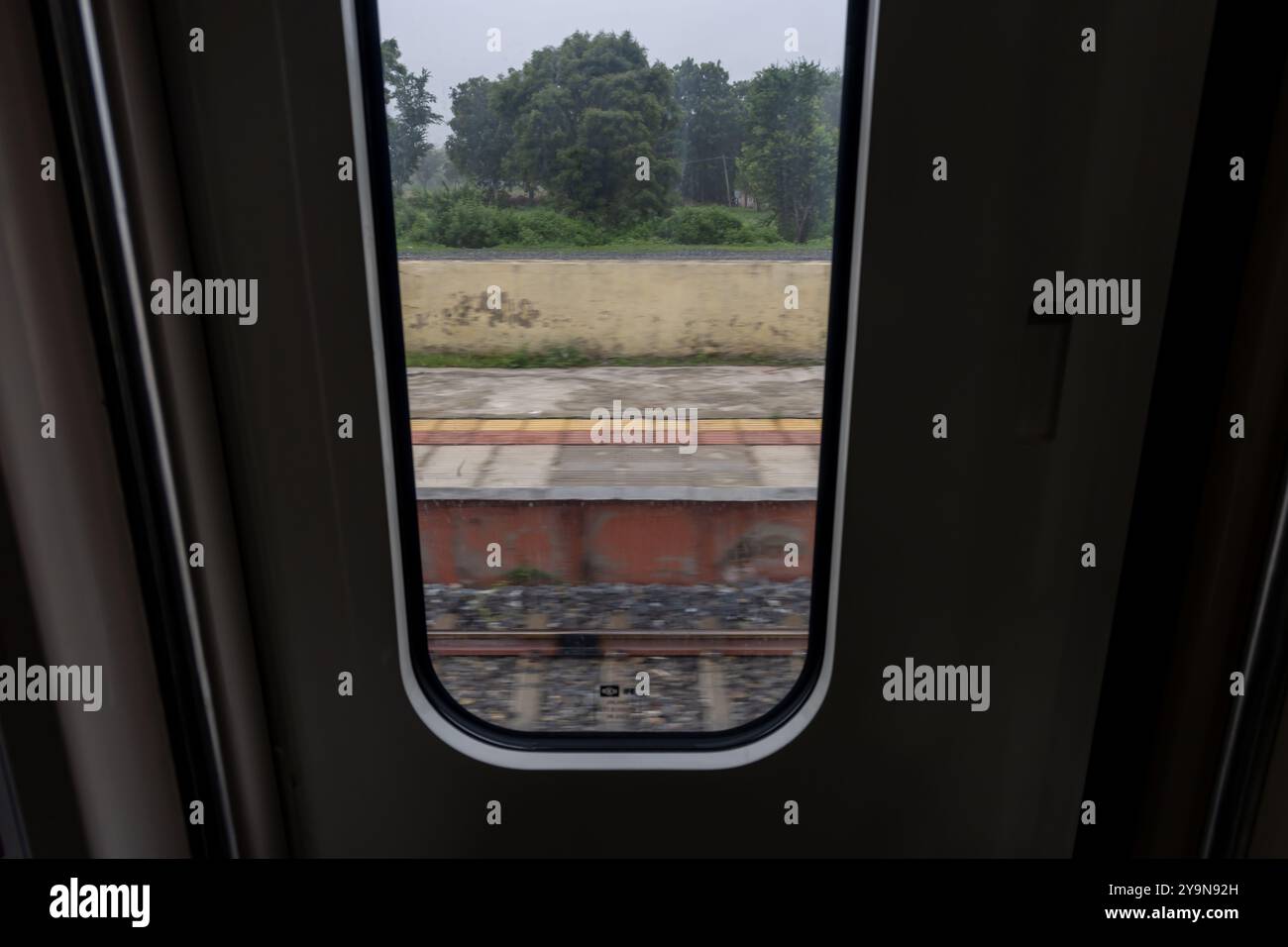 Passenger Train Door Window View During Daytime image is taken of vande ...