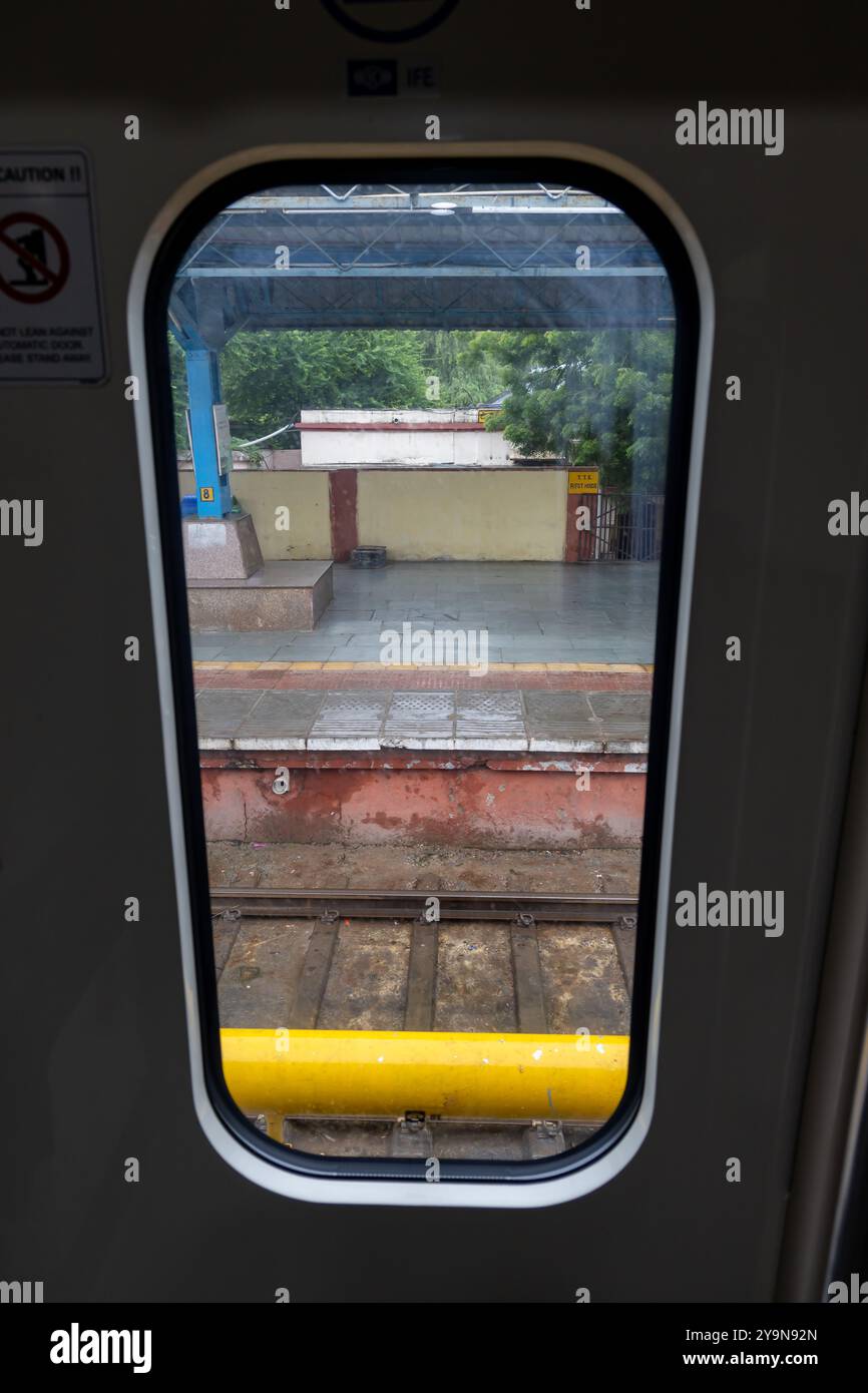 Passenger Train Door Window View During Daytime image is taken of vande ...