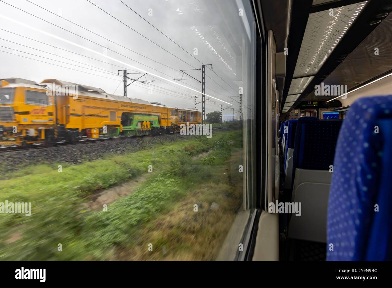 Passenger Train Window View During Daytime with motion blur image is ...