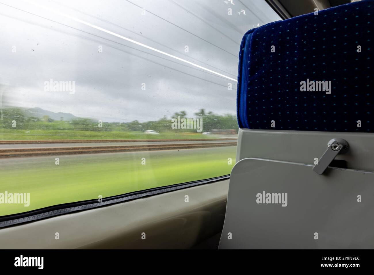 Passenger Train Window View During Daytime with motion blur Stock Photo ...