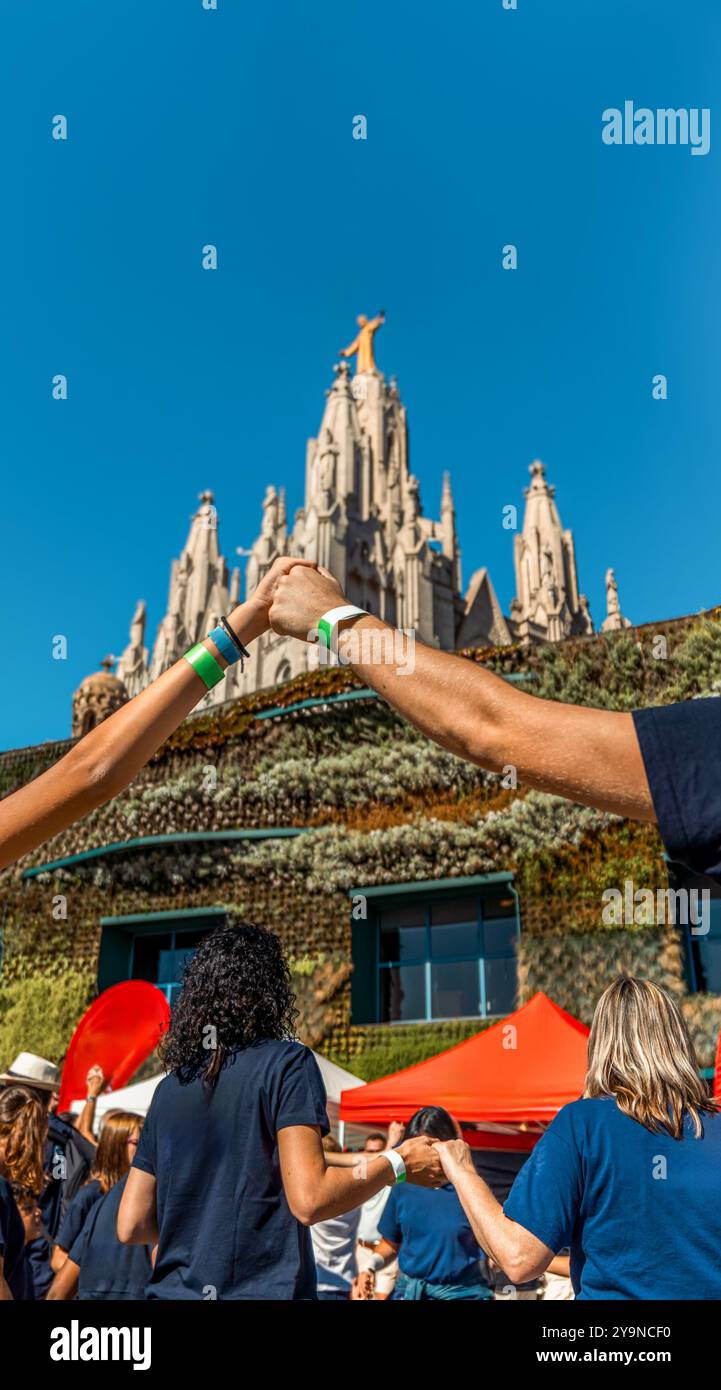 Young people from a cultural group dancing hand in hand the traditional ...
