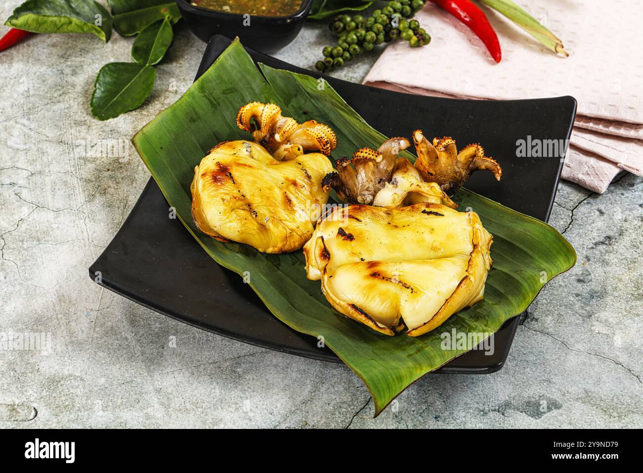 Delicous Grilled cuttlefish with sauce asian style Stock Photo - Alamy