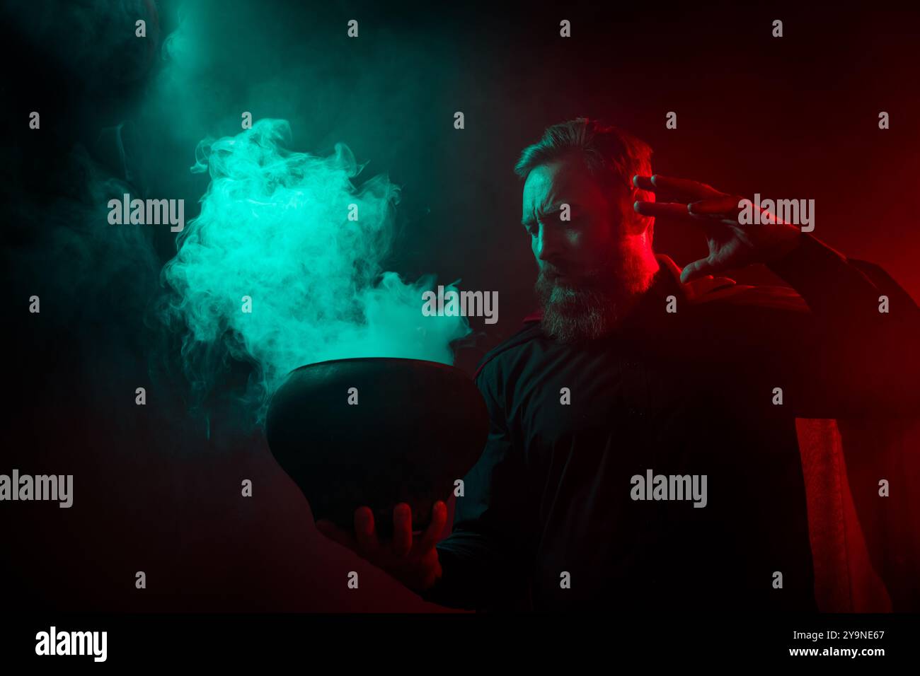 Photo of scary wizard warlock hold cauldron spell mystical ritual ...