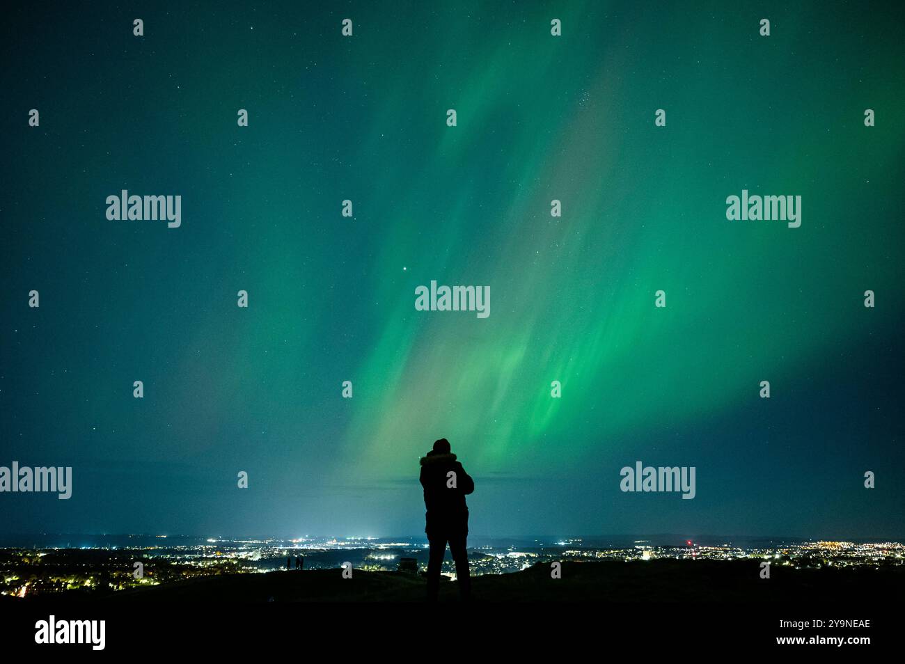 The aurora borealis (Northern lights), lights up the sky over Edinburgh ...