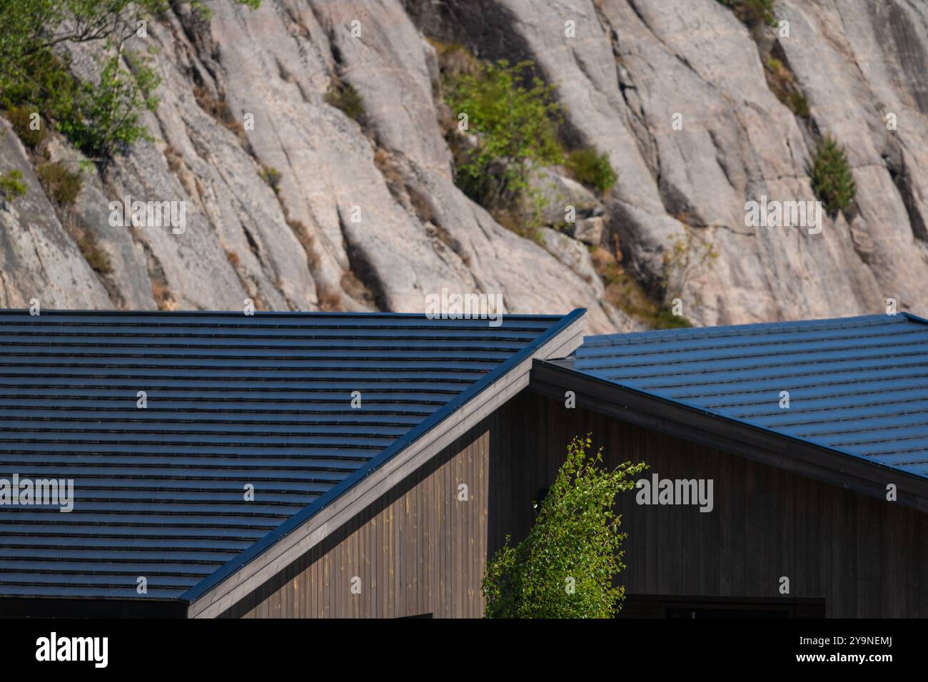 Two intersecting black roofs Stock Photo - Alamy