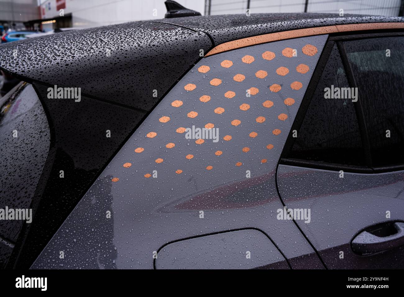 Copper decal details on the c-pillar of a car Stock Photo - Alamy