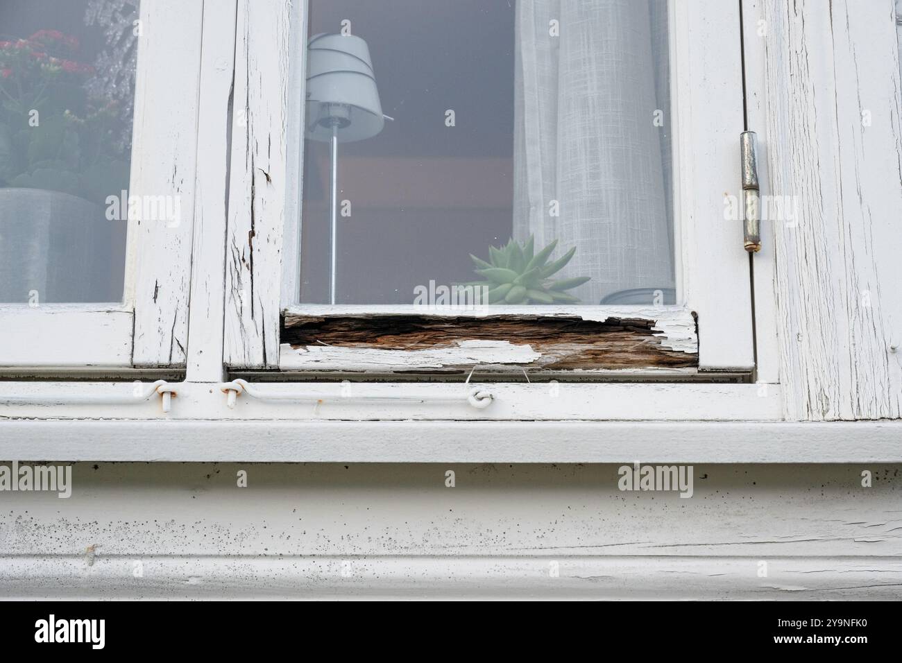 Rotten wood of a window frame Stock Photo - Alamy