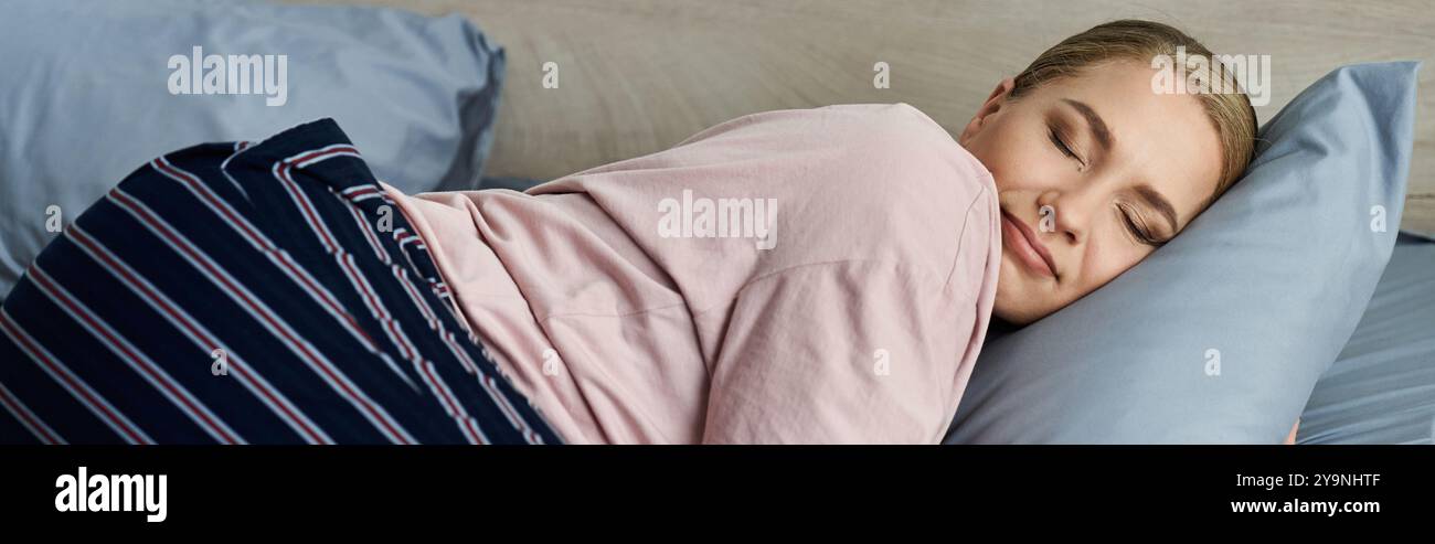 A young plus size woman enjoys a restful moment, lying comfortably on ...