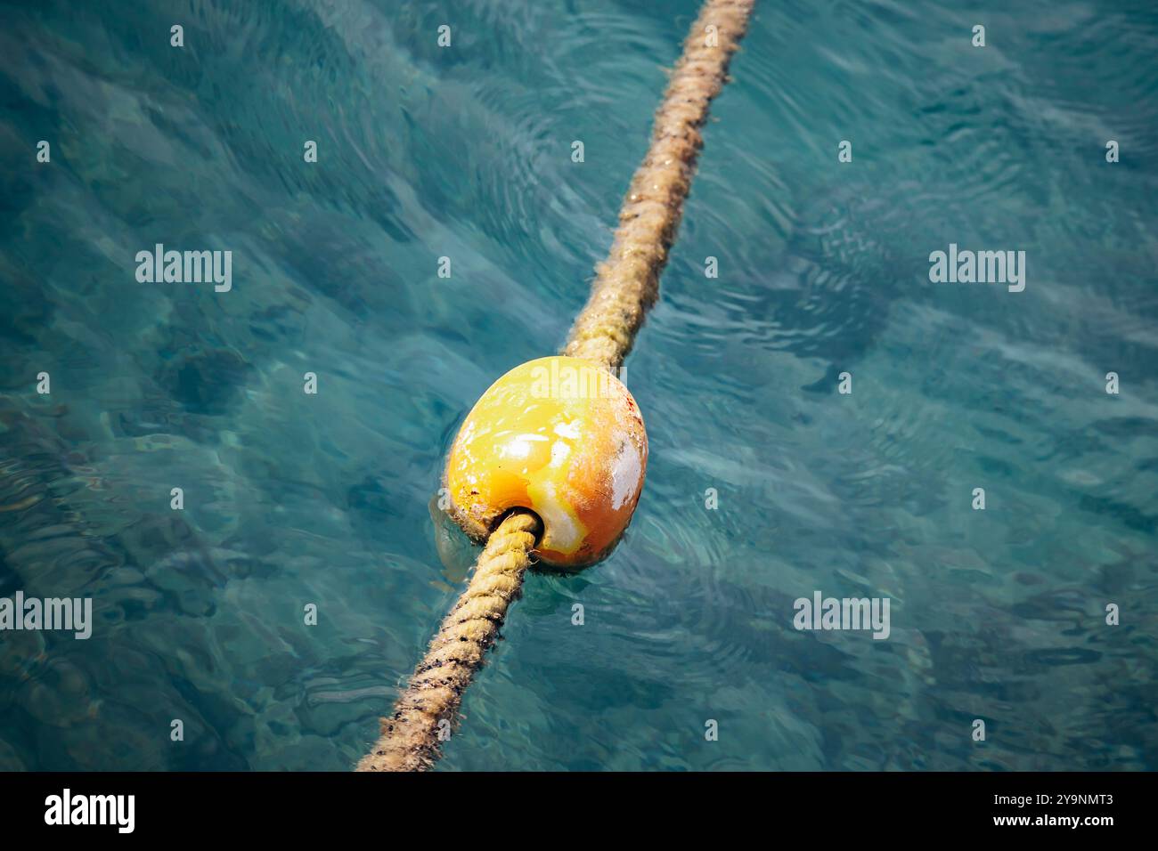Floating rope in the sea Stock Photo - Alamy