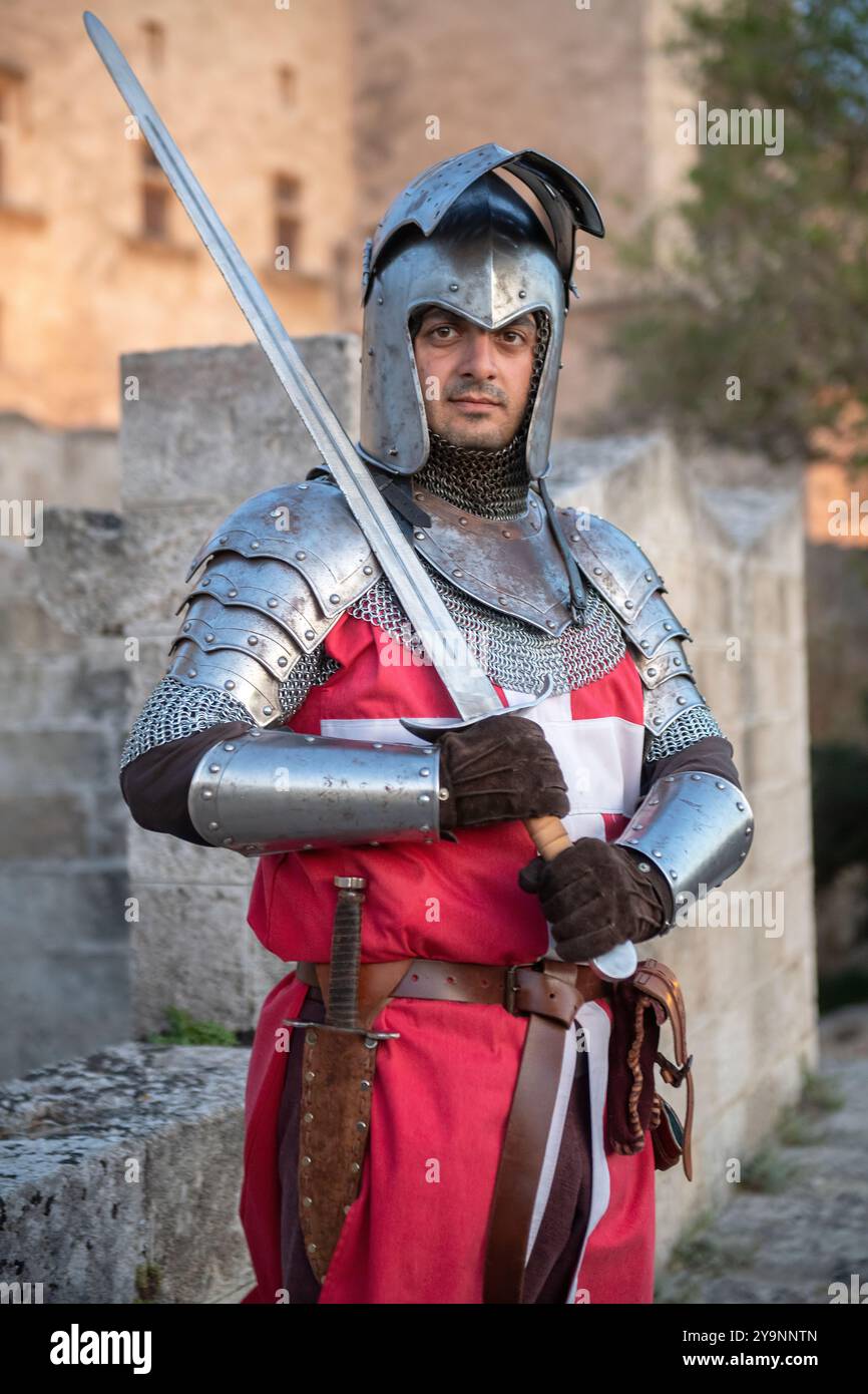 A member of the Rhodes Medieval Rose Association Knights' Swords Team ...