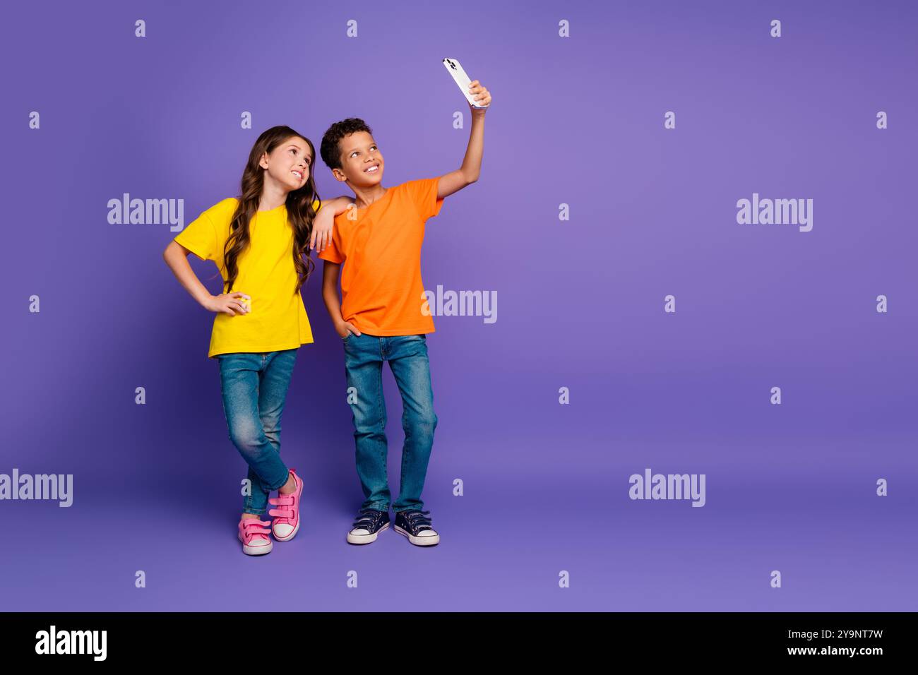 Full length photo of lovely two little kids take selfie photo dressed ...