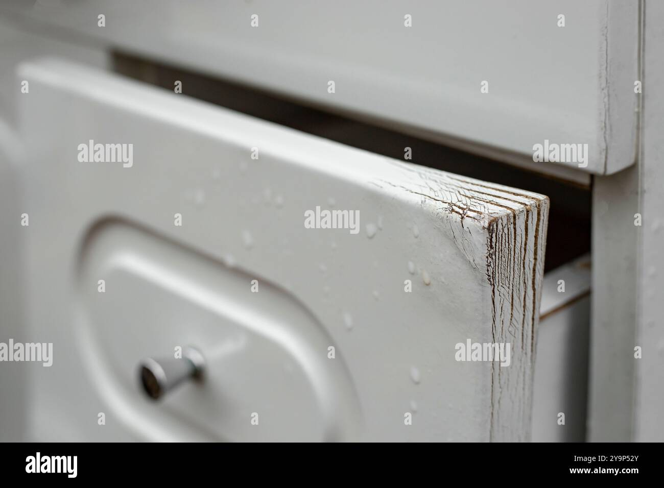 Water Damaged door from bathroom furniture, soft focus Stock Photo - Alamy