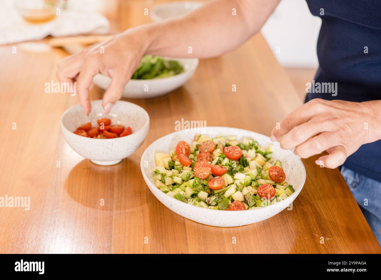 Adding salad dressing hi-res stock photography and images - Alamy