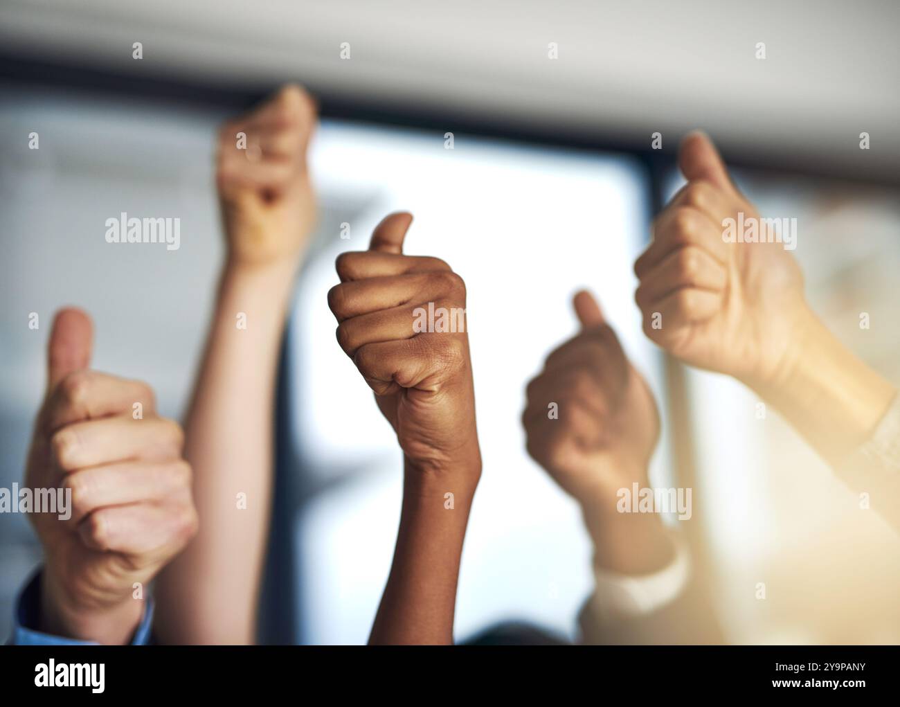 Thumbs up, good news and hands with business people in office for ...
