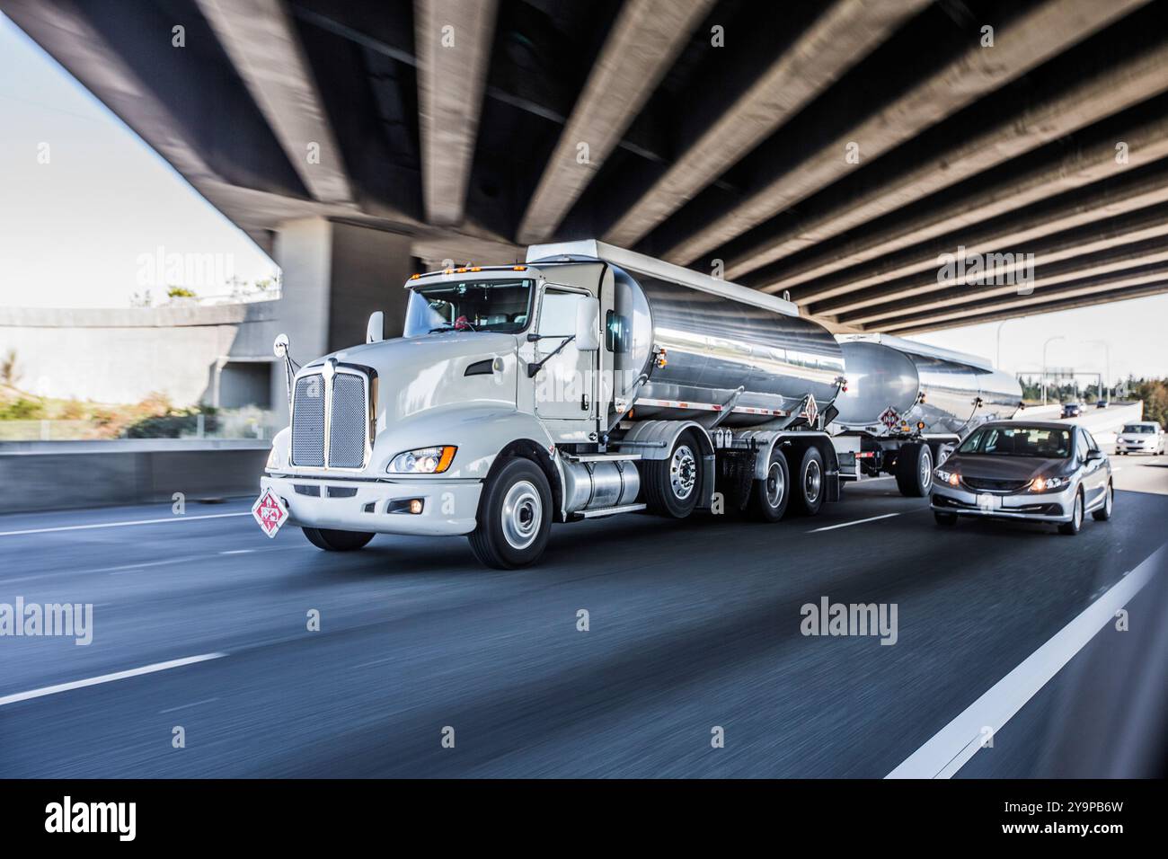 Fuel delivery truck enroute to gas station Stock Photo - Alamy