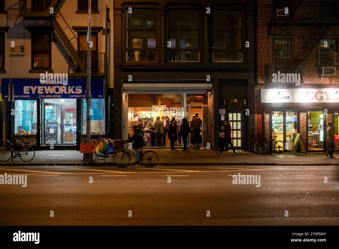 Nighttime New York City street scene Stock Photo - Alamy