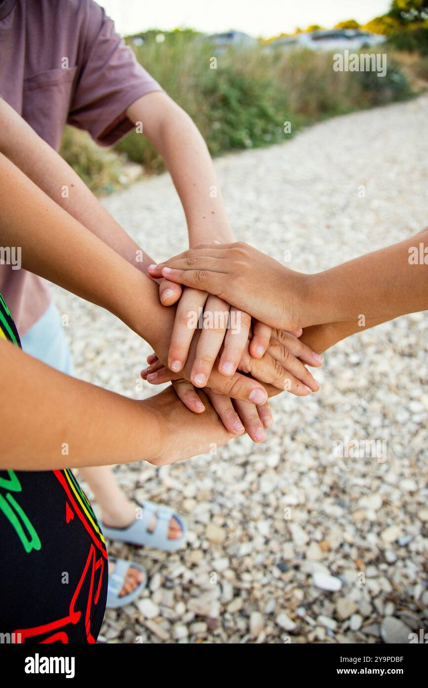 Hands together vertical hi-res stock photography and images - Alamy