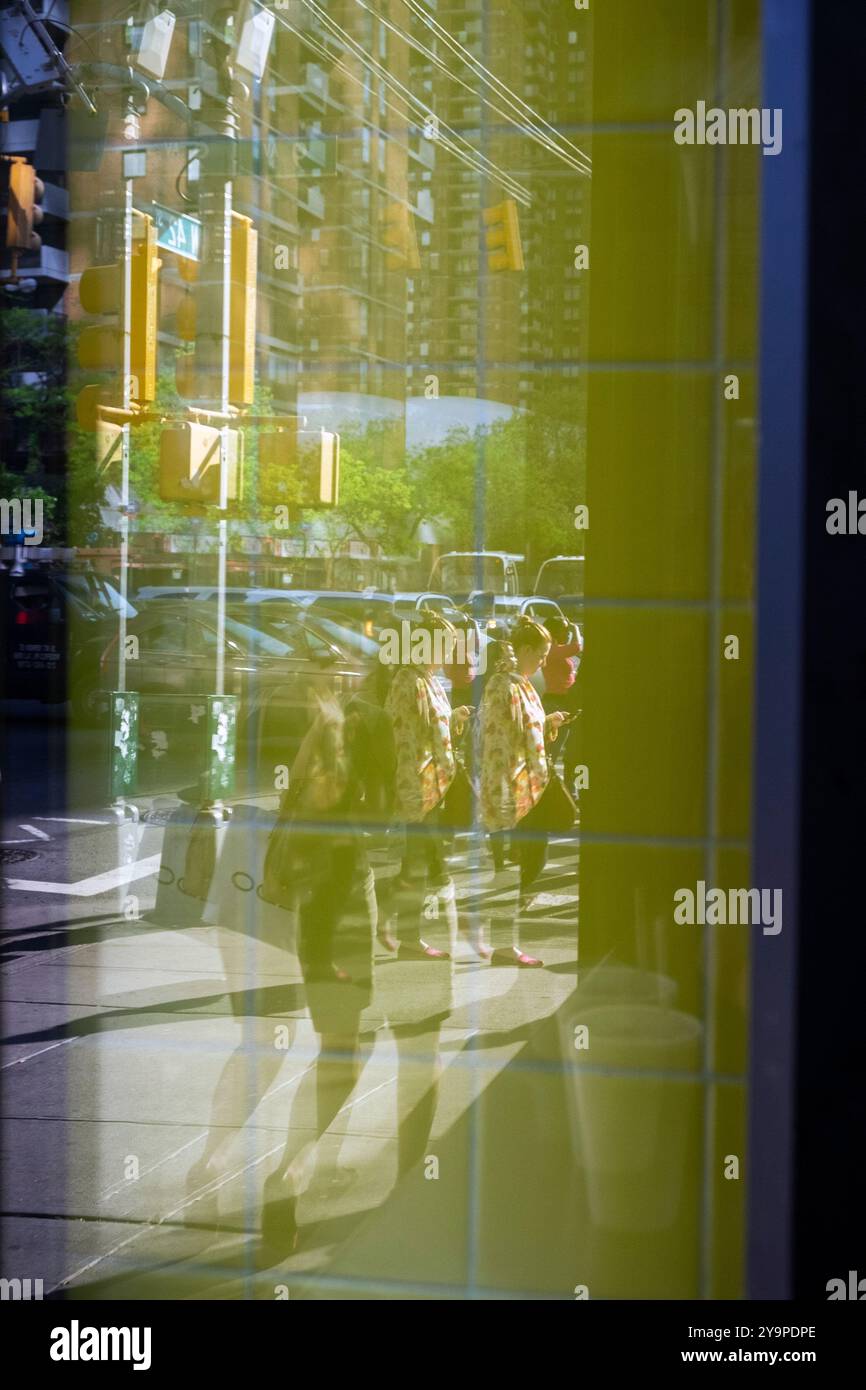 Window view showing multiple reflections New York City vertical Stock ...