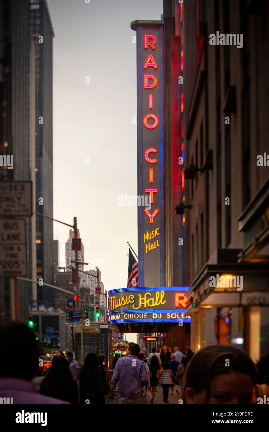 Radio City Music Hall street scene NYC vertical Stock Photo - Alamy