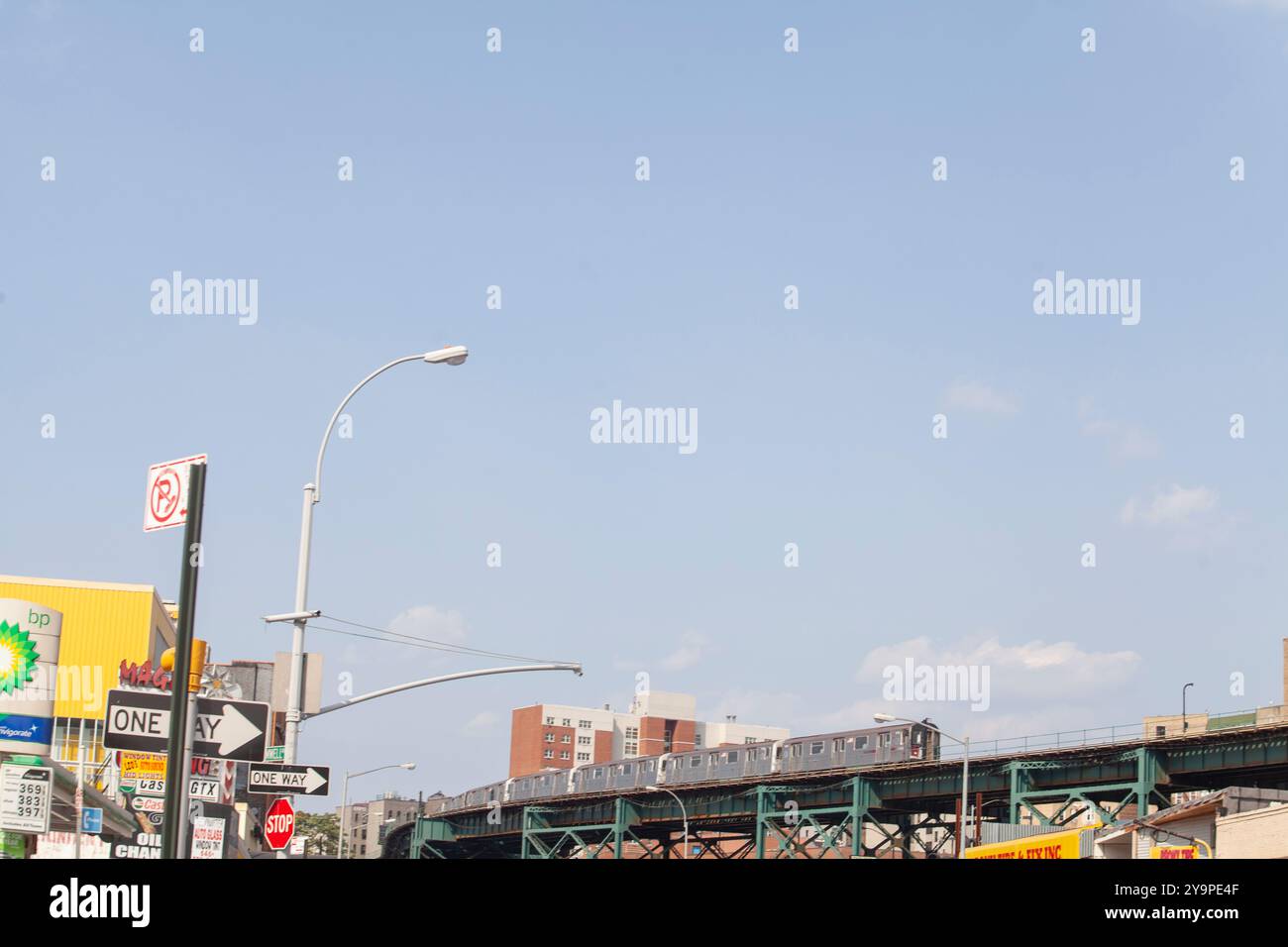 Subway train on the high line lots of blue sky above Stock Photo - Alamy