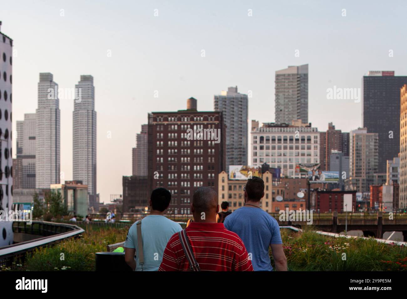 Walking behind people on the High Line in New York City Stock Photo - Alamy