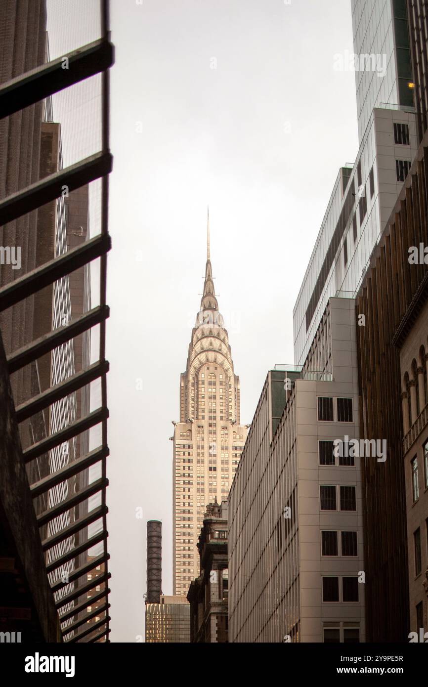 Chrysler Building rising above other buildings in NYC Stock Photo - Alamy