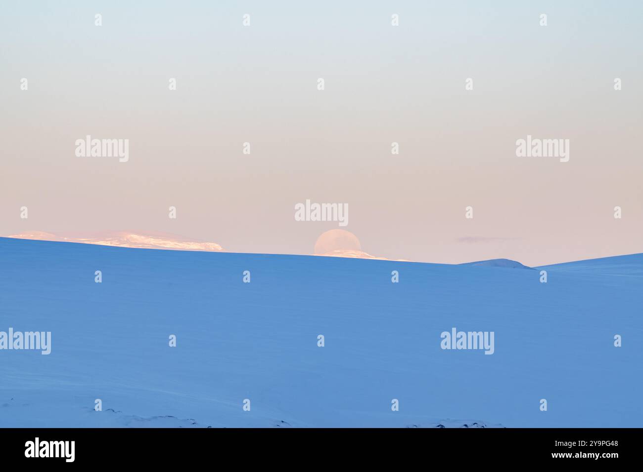 Full yellow moon in Antarctica. Night Stock Photo - Alamy