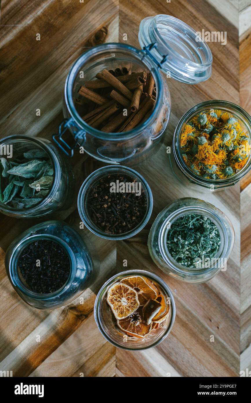 Grouping of mason jars full of herbs Stock Photo - Alamy