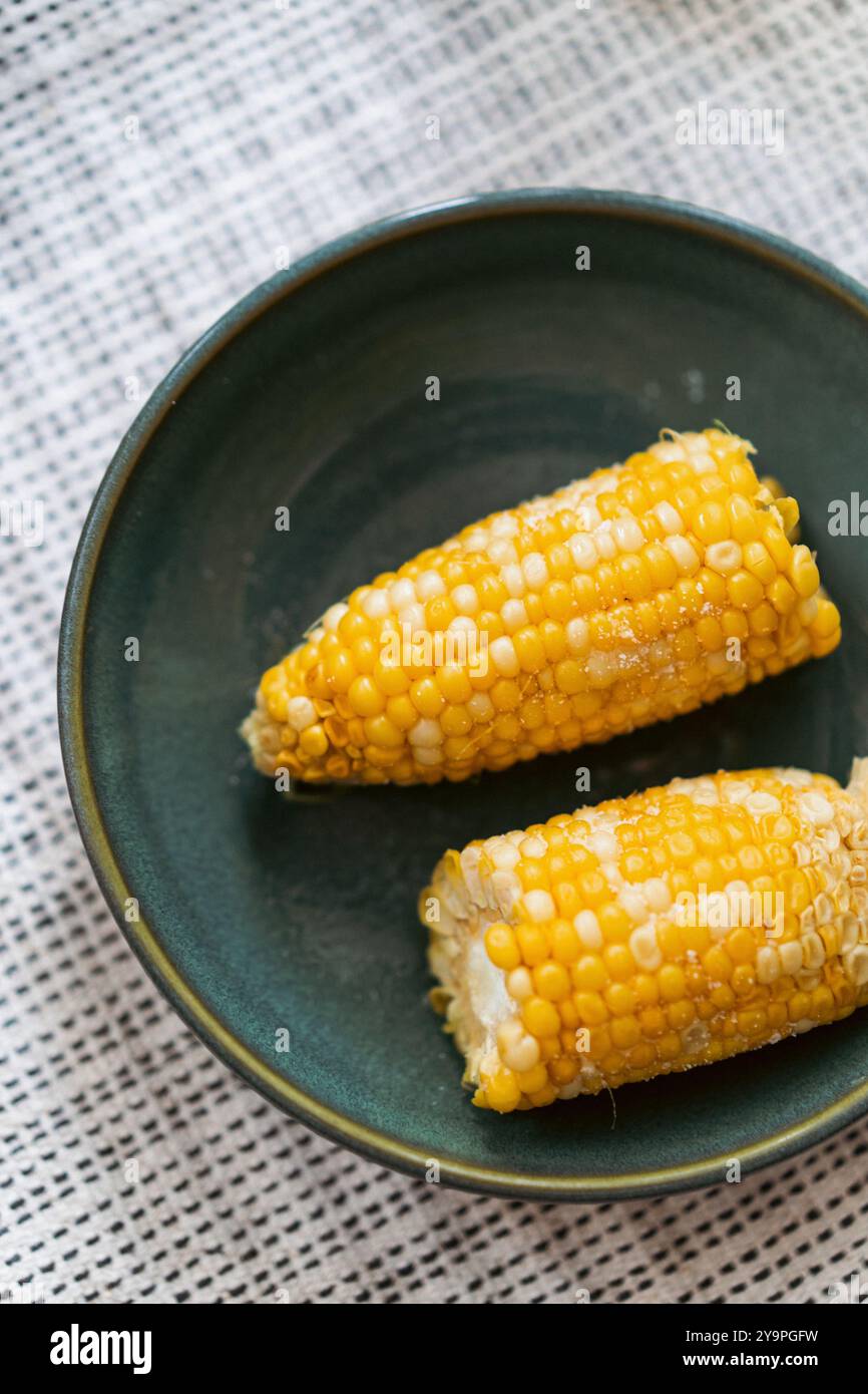 Boiled corn with salt, healthy eating Stock Photo - Alamy