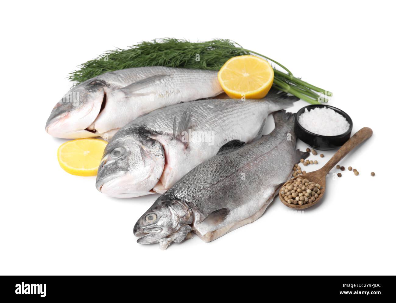 Sea food. Different types of fresh fish with spices isolated on white ...
