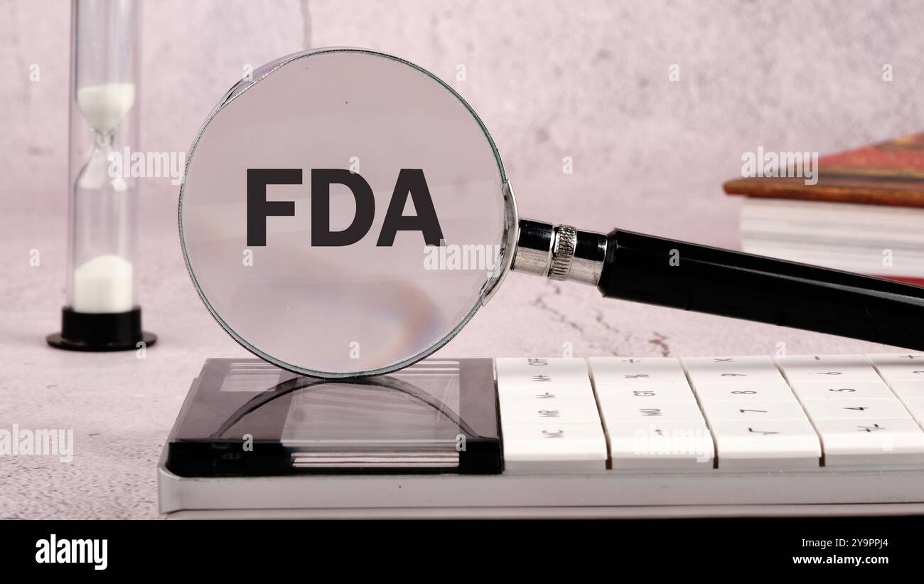 FDA, words on wooden blocks. Business concept,FDA written through a ...