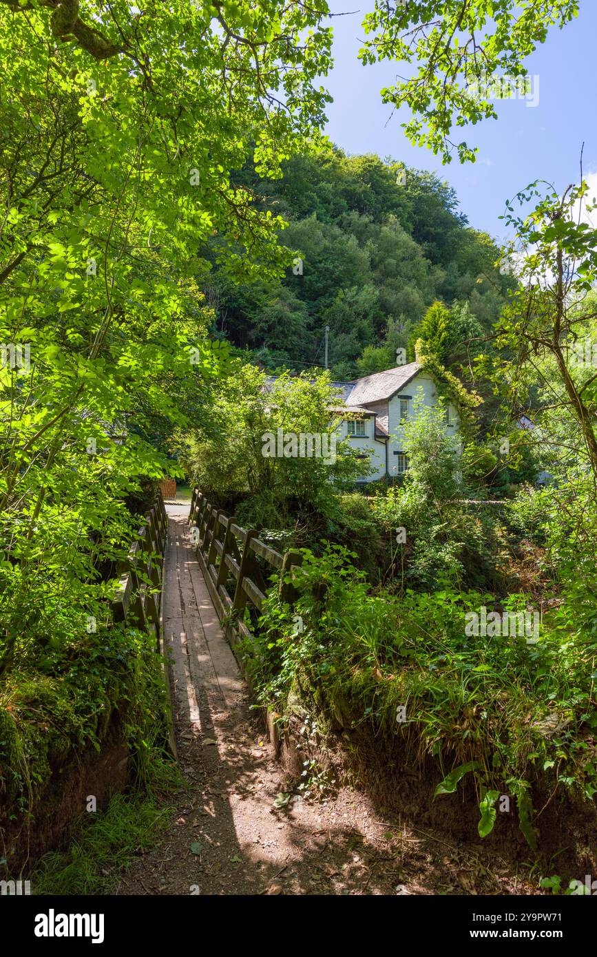 The footbridge over the East Lyn River at Rockford in the Brendon ...