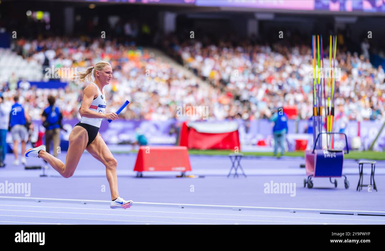 Hanne Claes participating in the 4X400 meters relay at the Paris 2024 ...
