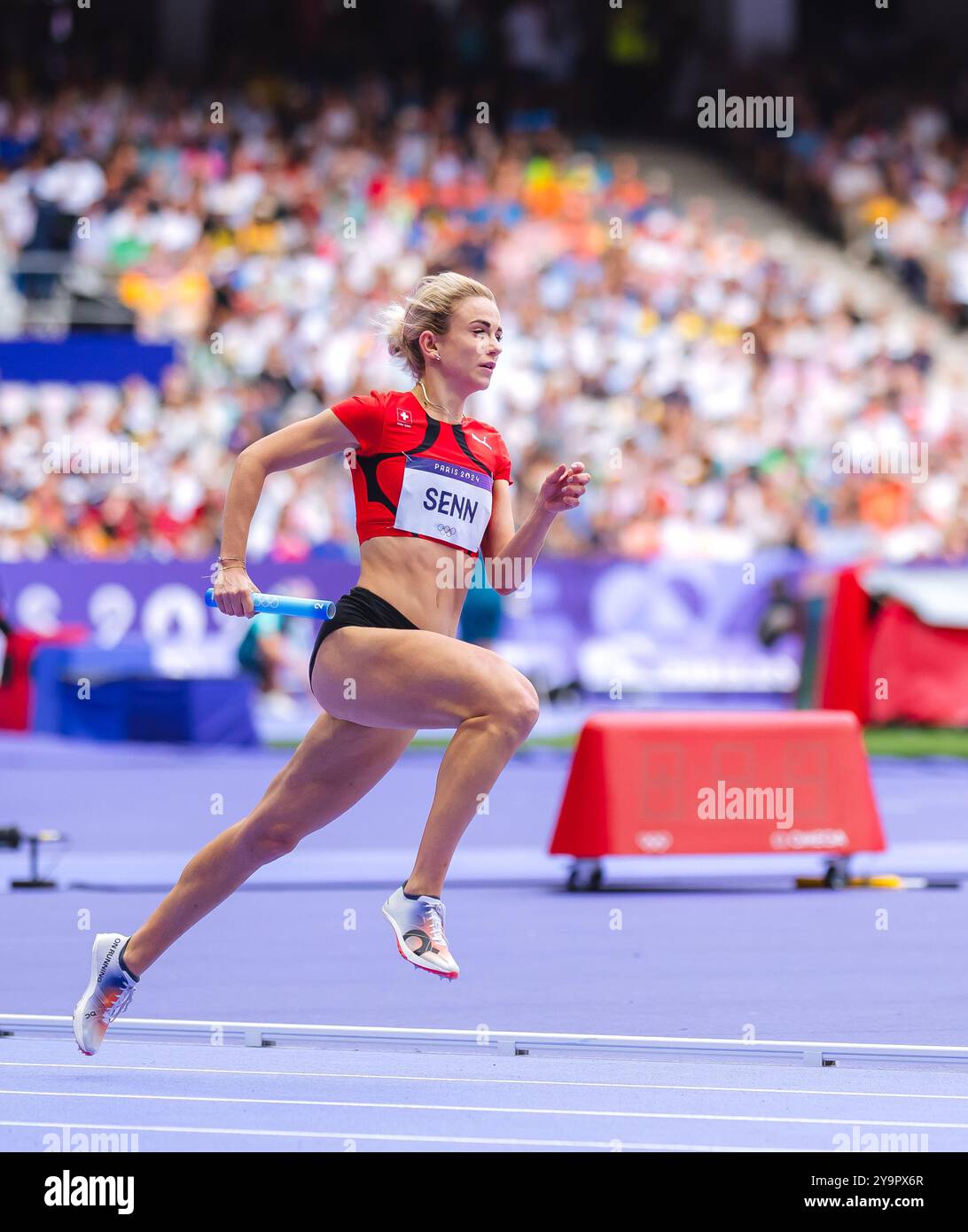 Giulia Senn participating in the 4X400 meters relay at the Paris 2024 ...