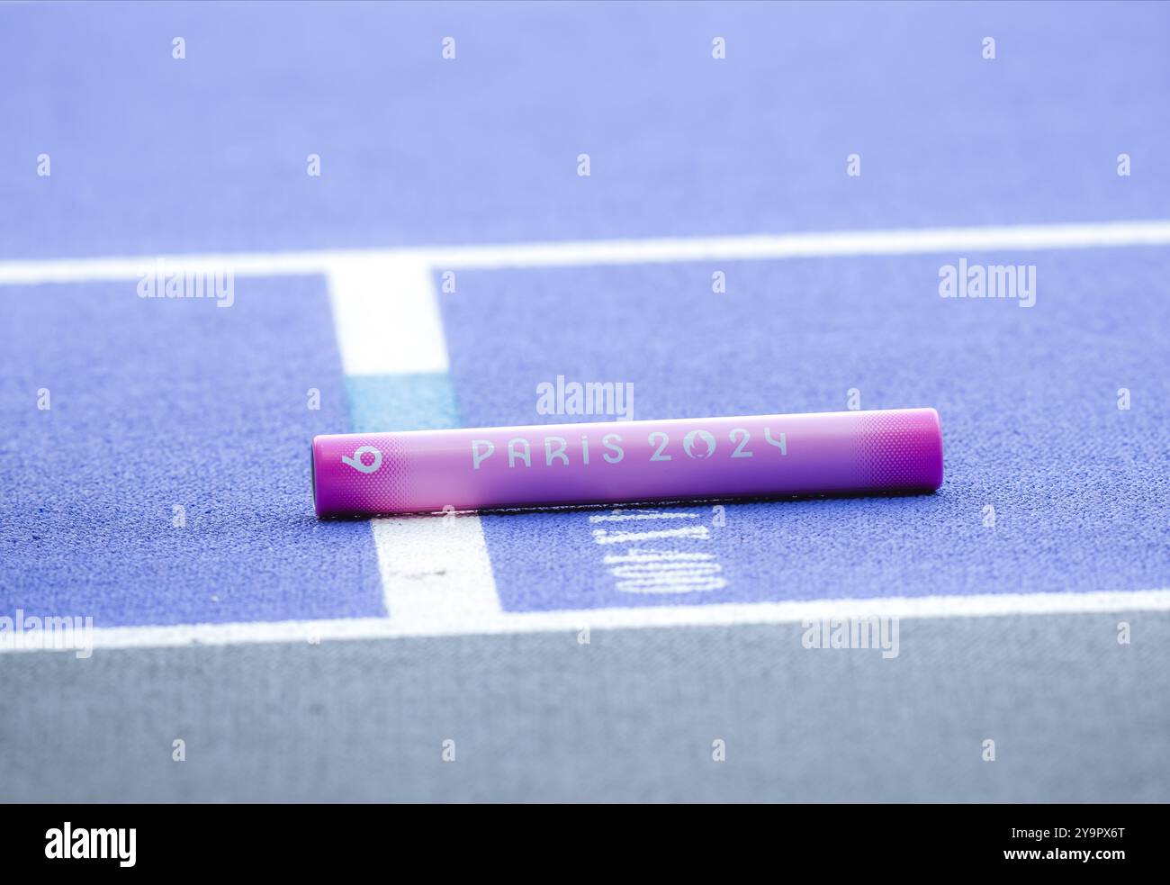 Relay stick at the Paris 2024 Olympic Games Stock Photo - Alamy