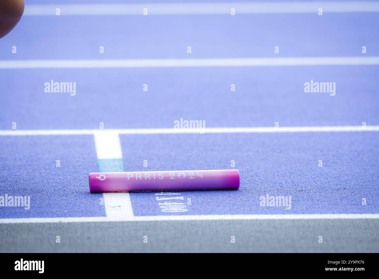 Relay stick at the Paris 2024 Olympic Games Stock Photo - Alamy