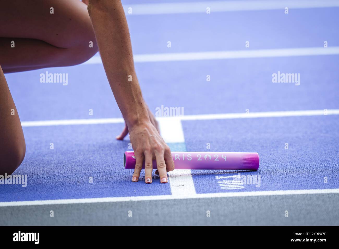 Relay stick at the Paris 2024 Olympic Games Stock Photo - Alamy