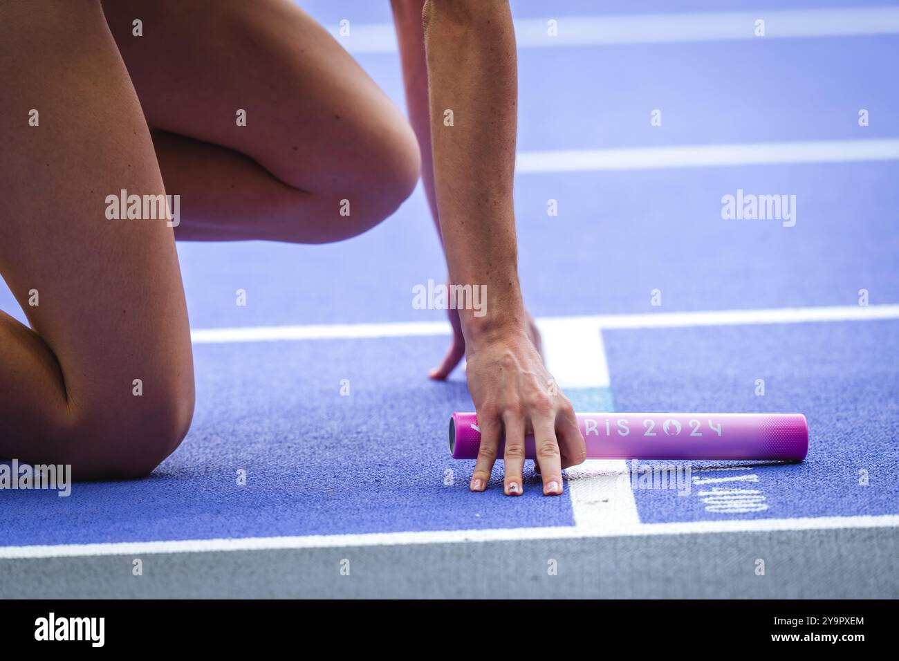 Relay stick at the Paris 2024 Olympic Games Stock Photo - Alamy